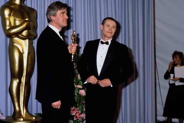 PRODUCTION DESIGNER STUART Craig holding his Best Art Direction aw- Old ...