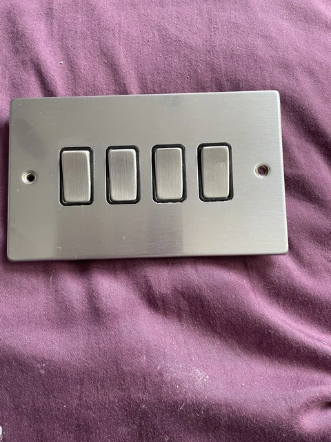 INTERRUTTORI LUCE CROMATO spazzolato 4 interruttori nero con contorno ...