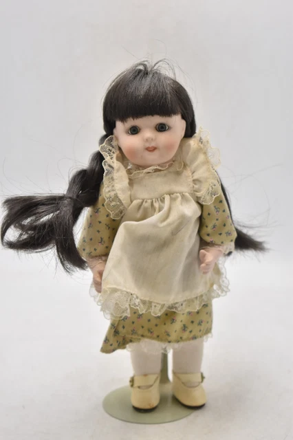 VINTAGE PORCELAIN DOLL Black Hair Blue Eyes Floral Dress 25cm ...