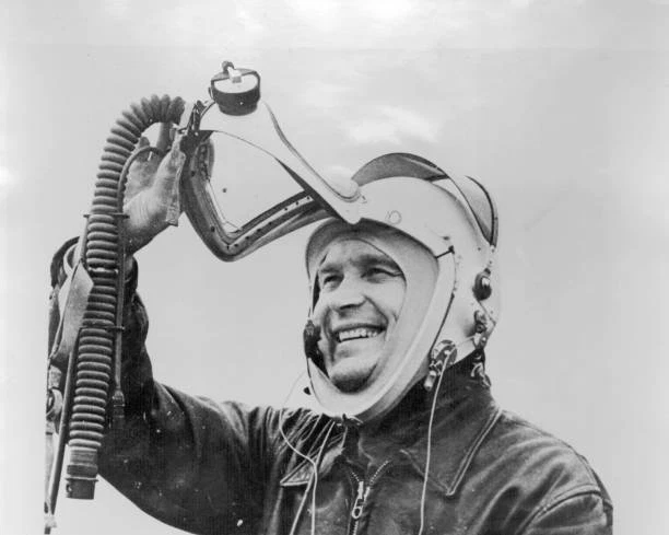 RUSSIAN TEST PILOT Anatole Andreevich Koznov raising helmet vis- 1962 ...