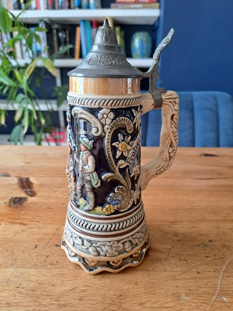 VINTAGE GERMAN BEER Stein Tankard Embossed Design Pewter Lid Musical £ ...