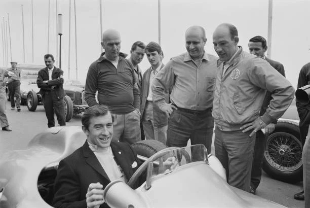 BRITISH FORMULA ONE racing driver Jackie Stewart on board a racing ...