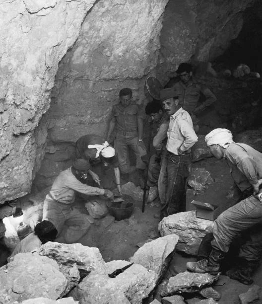 ISRAELI ARCHAEOLOGIST YIGAEL Yadin at the excavation site of the D- Old ...