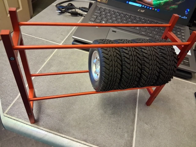 TAMIYA 1/10 RC Land Rover Wheels and Tyres with Tyre Rack - Unused £8. ...