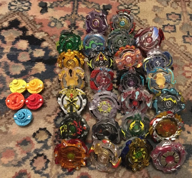 HASBRO BEYBLADE BURST Bundle Lot 26 Beyblades Genuine Mixed Parts £59. ...