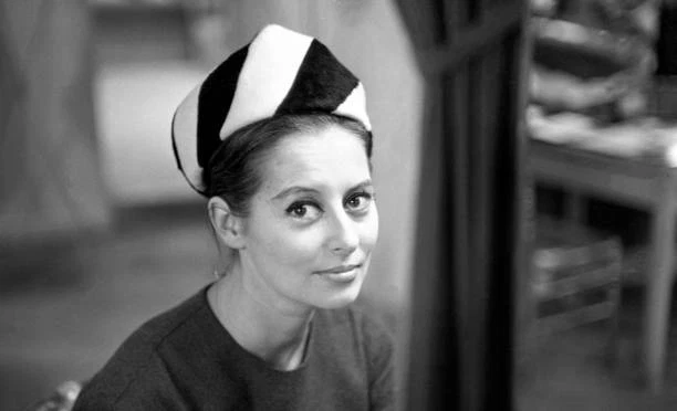 ZARINA RAHMAN DURING a fitting session at hat designer Jean Ba- 1962 ...