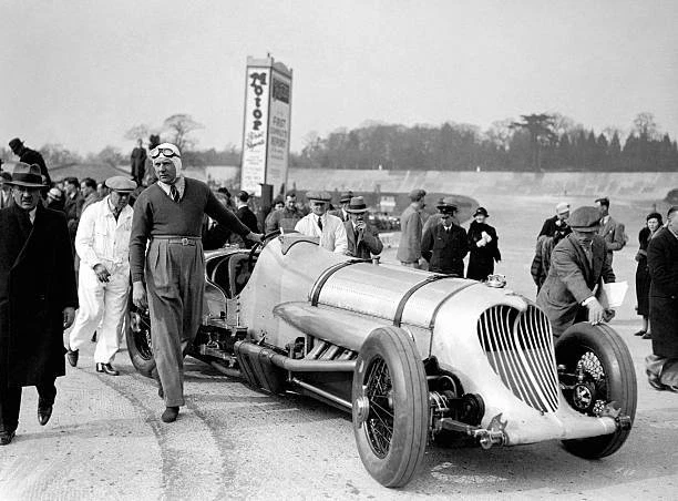 BRITISH RACING DRIVER John Rhodes Cobb with his 24 litre Napier Railton ...
