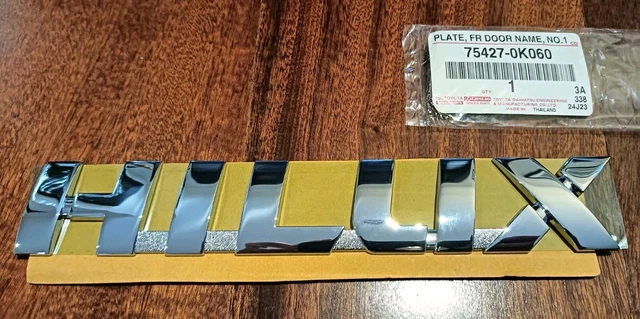 GENUINE TOYOTA HILUX TGN36 Rear Back Tailgate Badge Emblem OEM: 75427 ...