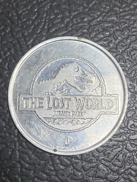 JURASSIC PARK THE lost world Velociraptor coin. token EUR 4,09 ...