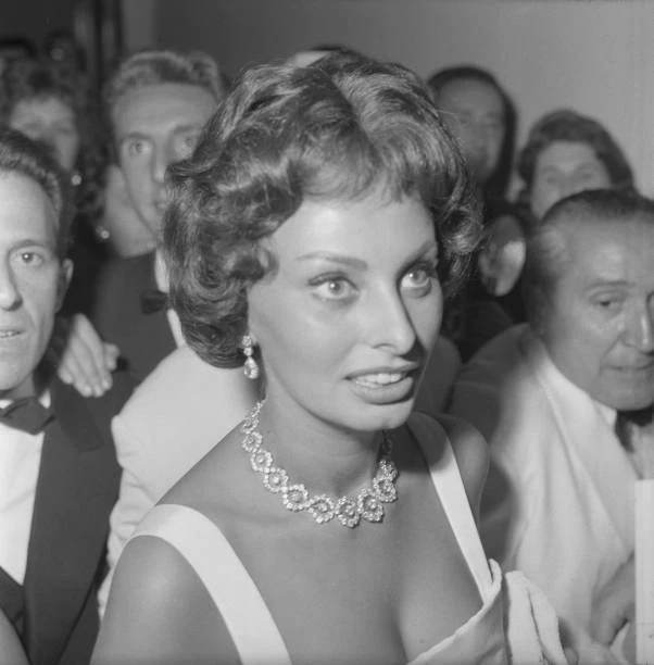 SOPHIA LOREN WEARING A White Evening Dress And And Jewels Ea - 1958 ...