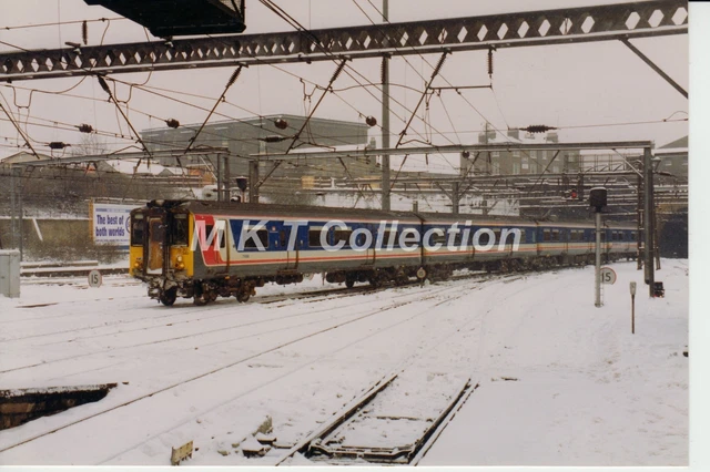 RAILWAY PHOTO CLASS 317 317345 arrives @ Kings Cross in snow 9/2/91 £1. ...