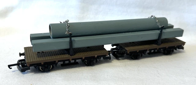 00 GAUGE TWIN radial-bolster flat car with pipe load - Lima - Excell ...