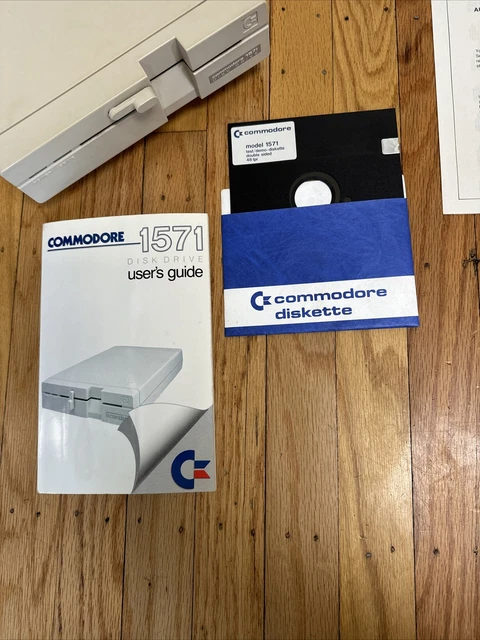VTG COMMODORE 64 FLOPPY DISK DRIVE 1571 C64 +4 C128 Box Manual Cables ...