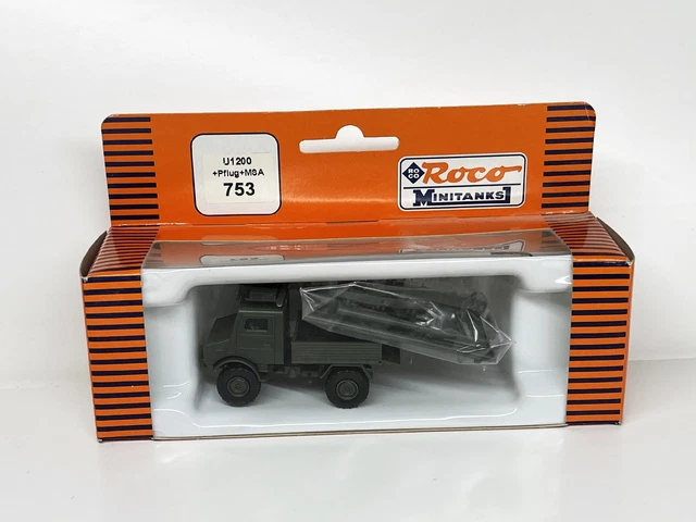 1:87 ROCO MINITANKS 753 Unimog U1200 + Pflug + MSA / 4 G 266 EUR 5,00 ...