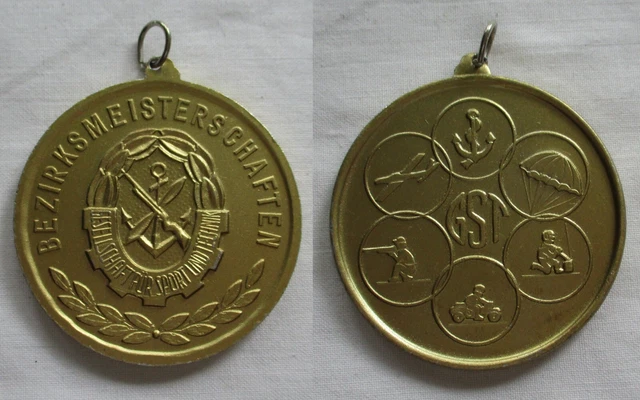 DDR MEDAILLE GST Bezirksmeisterschaften Stufe Gold um 1975 (151524) EUR ...