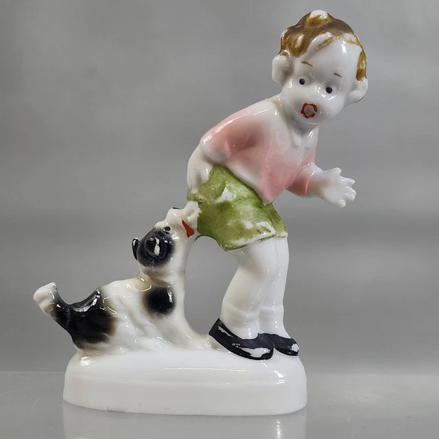 ANTIQUE GERMAN FAIRING Figurine Porcelain Dog Biting Boy Girl Early ...