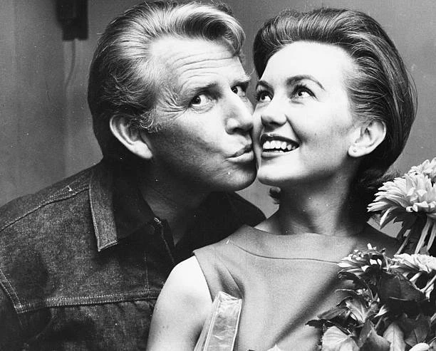 SINGER JACKIE RAE kissing wife actress Janette Scott cheek birthday ...