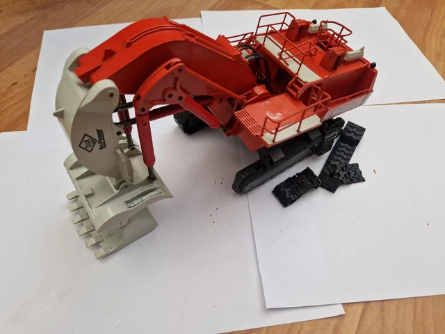 CONRAD SCALA 1/50 - Escavatore Idraulico Cingolato O&K Rh120C Modello ...