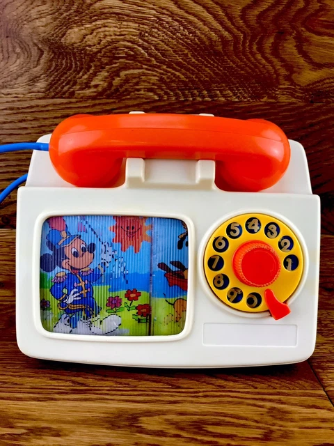 VINTAGE DISNEY CHARACTERS Musical Scrolling Telephone Wind Up Toy Very ...