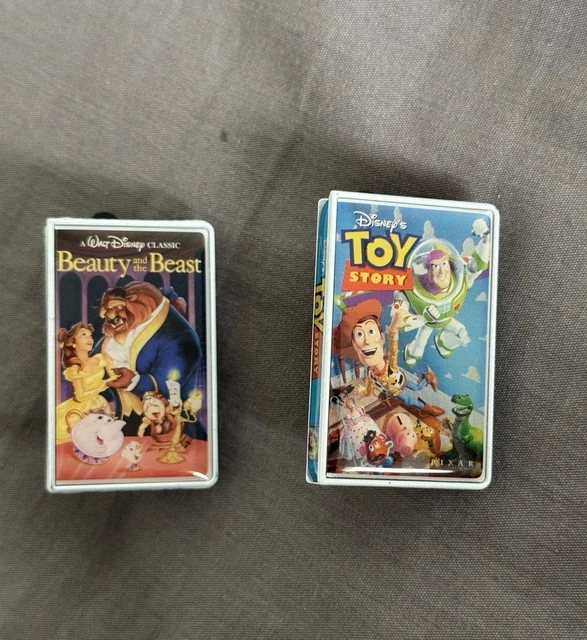 DISNEY PINS VHS Pin Bundle X2 Toy Story and Beauty and the Beast £21.52 ...