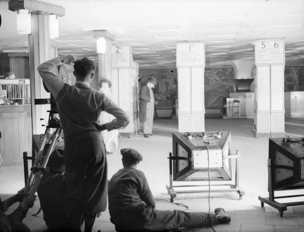 ACTORS ELSIE BOWER and Billy Rutherford being filmed on location a ...