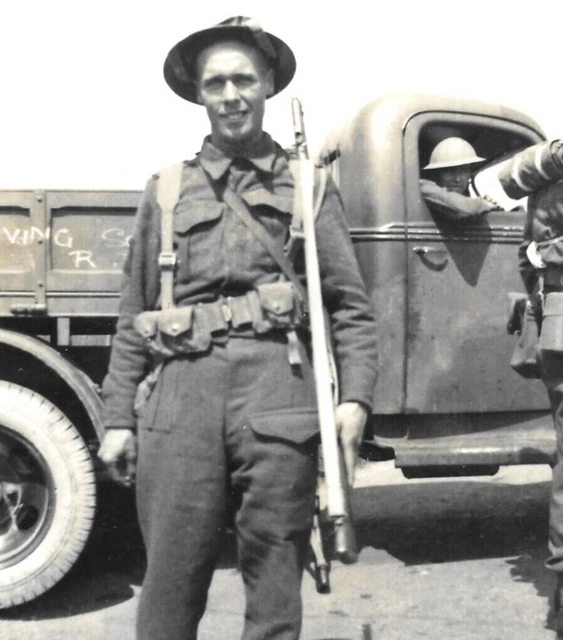 WW2 MILITARY PHOTO Postcard Happy British Soldier Posing Rifle Van $14. ...