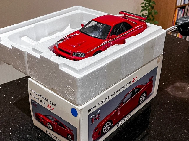 AUTOART NISSAN SKYLINE R34 GTR Nismo R-Tune R1 1:18 77357 Active Red £ ...