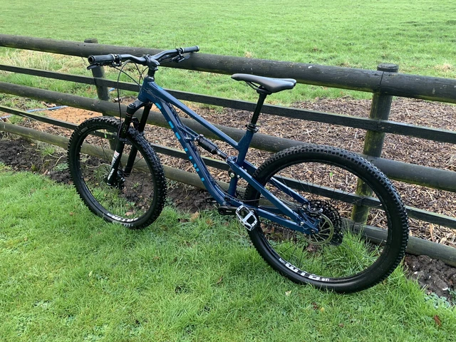 Triple suspension bike store