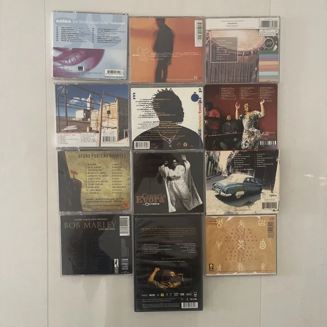 12 💿 C Evora Marley Ismael Isaac Sergent Garcia Farafina Cheb Mami EUR ...