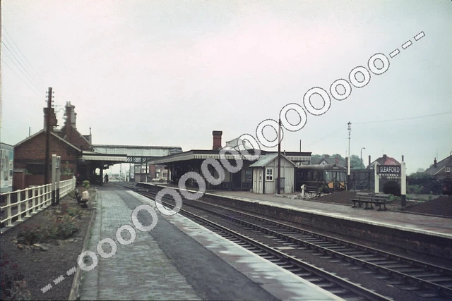 35MM ORIGINAL COLOUR SLIDE OF SLEAFORD STATION WITH A DMU IN 1965. £3. ...