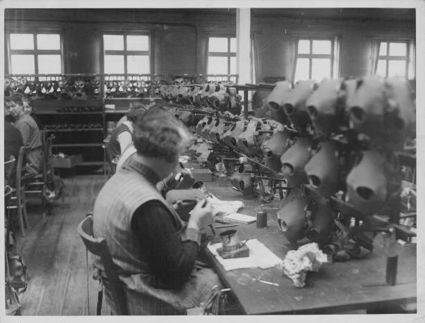 FACTORY WORKERS A German gas mask factory during World War Two, Ge Old ...
