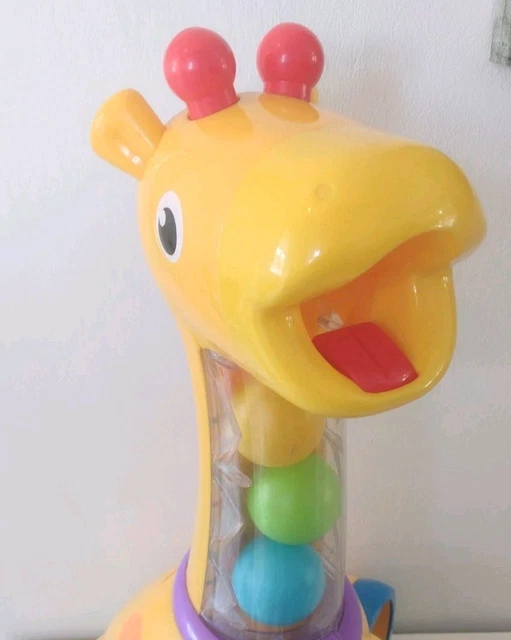 BRIGHT START SPIN and Giggle Giraffe Toy Music Light Balls, Ball Popper ...