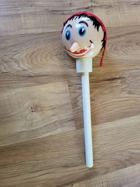 VINTAGE PLASTIC PINOCCHIO Head Spinning Musical Rattle On Wood Handle £ ...