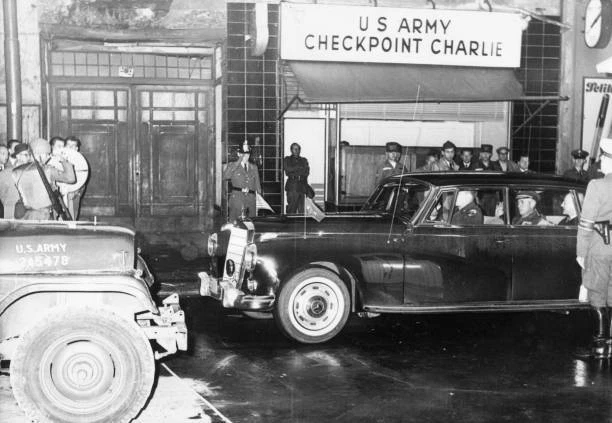 MILITARY PERSONNEL A car pass through US Army's Checkpoint Char- 1962 ...