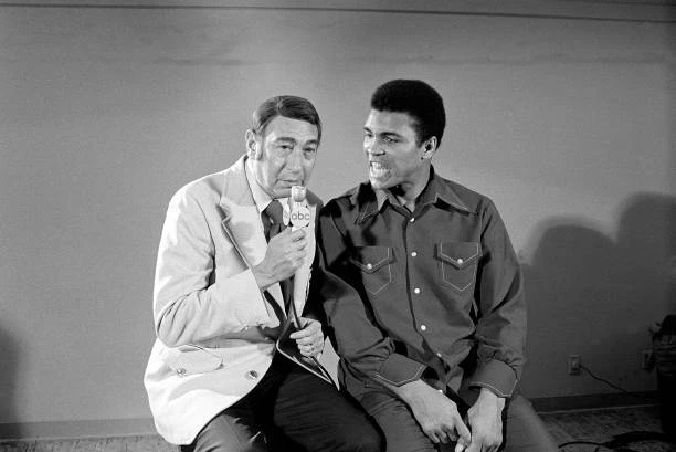 MUHAMMAD ALI WITH ABC Sports announcer Howard Cosell during - 1973 Old ...