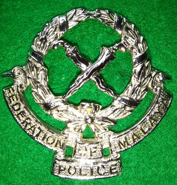 FEDERATION OF MALAYA Obsolete Police Cap Badge with pair of Malay Kris ...