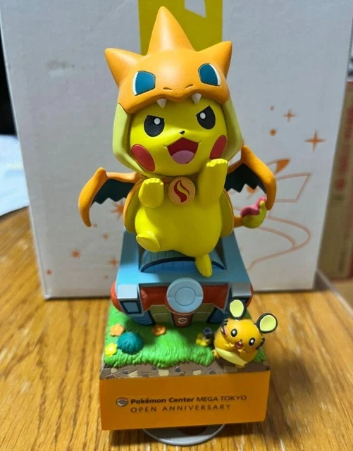 PIKACHU CHARIZARD PONCHO Pokemon center Mega Tokyo Aniversary statue ...