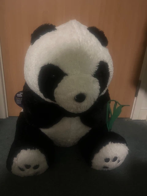 LARGE WHITE AND black plush toy panda holding a green bamboo £50.00 ...