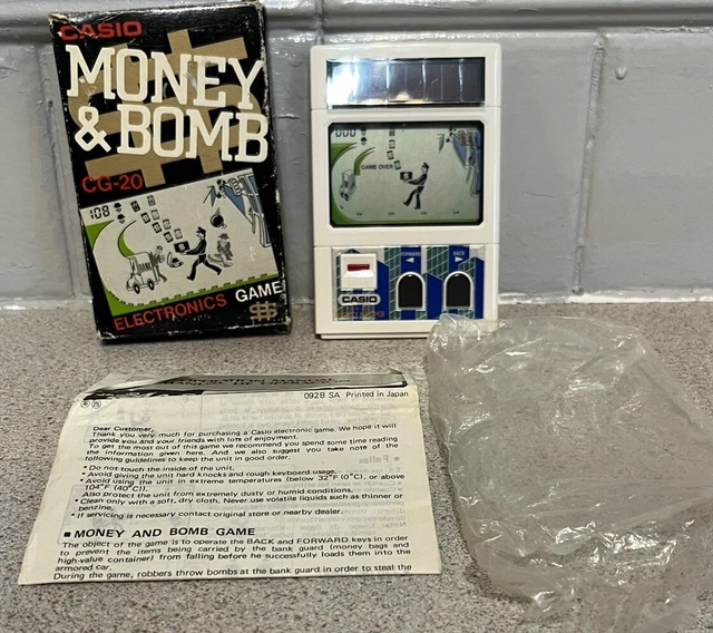 VINTAGE RARE 1983 CASIO MONEY & BOMBS CG-20 Solar LCD Game (Complete ...