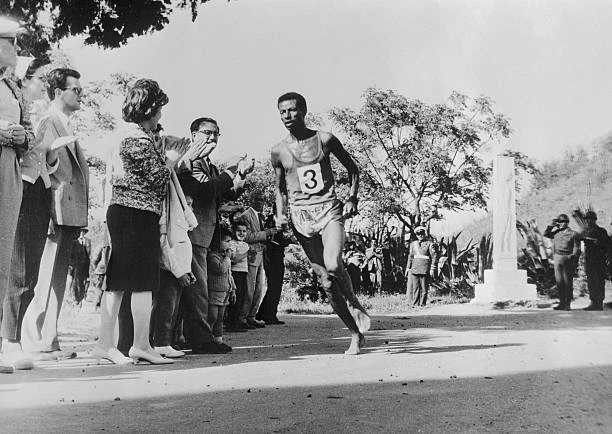 ETHIOPIAN 1960 OLYMPIC champion Bikilla Abebe running barefoot- 1961 ...