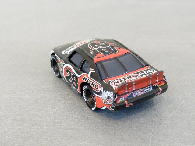 VOITURE DISNEY CARS NITROADE N° 28 AIKEN AXLER Métal 1/55eme FLASH ...
