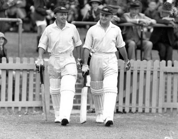 AUSTRALIAN CRICKETERS SIR Don Bradman Stan McCabe going out field t ...