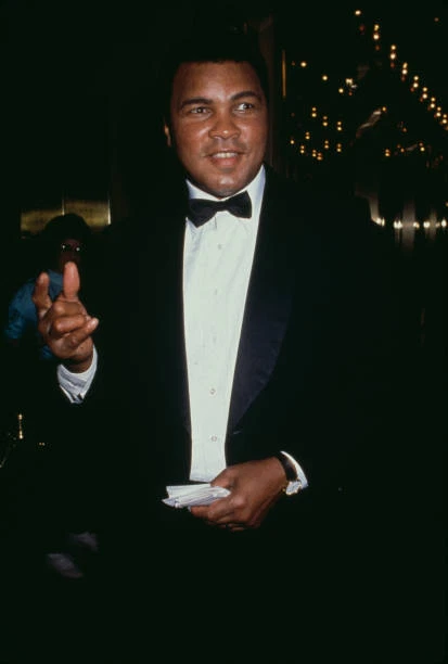 AMERICAN HEAVYWEIGHT BOXER Muhammad Ali wearing a tuxedo to an eve- Old ...