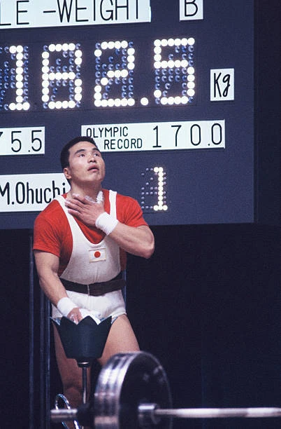 MASASHI OHUCHI OF Japan Competes In The Men's Weightlifting Mid 1964 ...