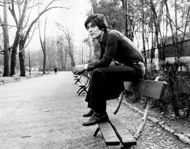 ITALIAN ACTOR PAOLO Giusti sitting on the back of a bench Milan - 1970 ...