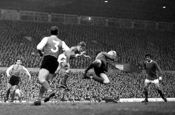 SHEFFIELD WEDNESDAY GOALKEEPER Ron Springett makes a flying sa- 1968 ...