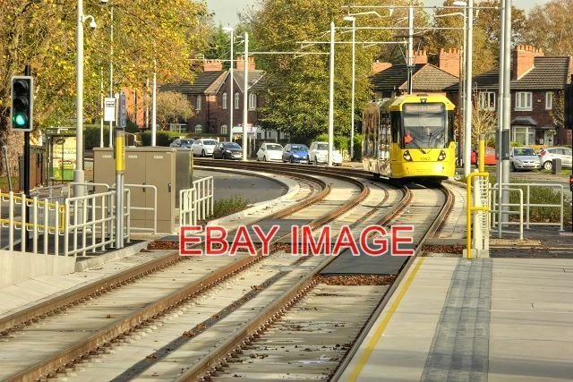 PHOTO METROLINK Tram Number 3062 Approaches The Track-Level Pedestrian ...