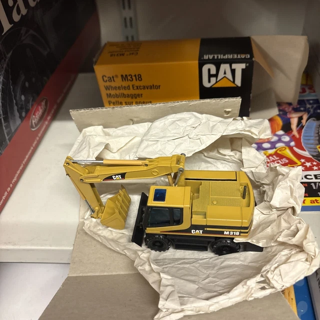 NZG 405 CAT M318 Wheeled Excavator, 1:50, Ltd Edition, BNIB rare colour ...