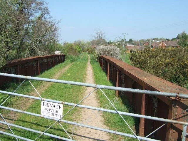 PHOTO 6X4 FORMER railway bridge over River Otter Tipton St John The ...