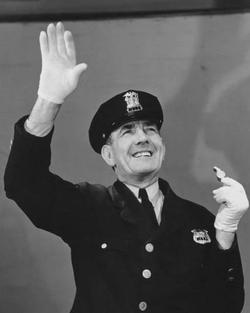 TRAFFIC POLICE OFFICER Thomas Mulligan in uniform, wearing whit 1955 ...